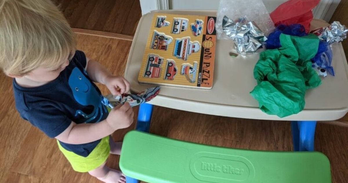 Fine Motor Puzzle Piece Unwrap Activity for Toddlers - HOAWG