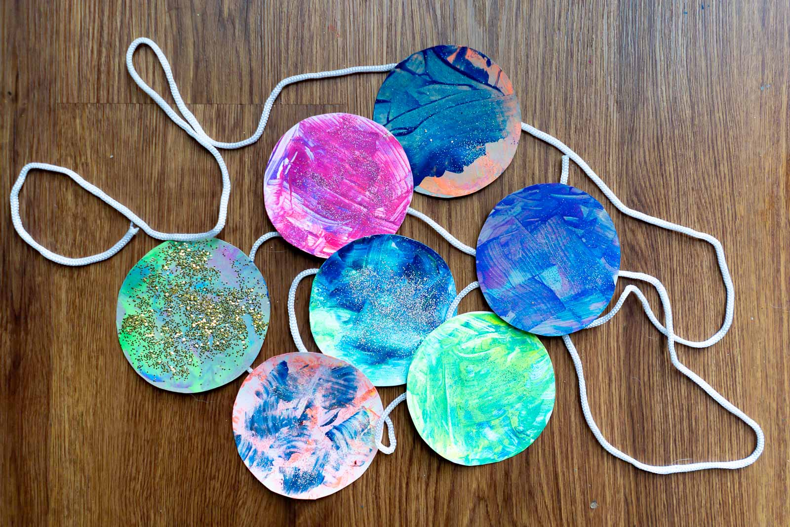 A Great Garland Craft Made From Your Child's Sparkly Scrape Art