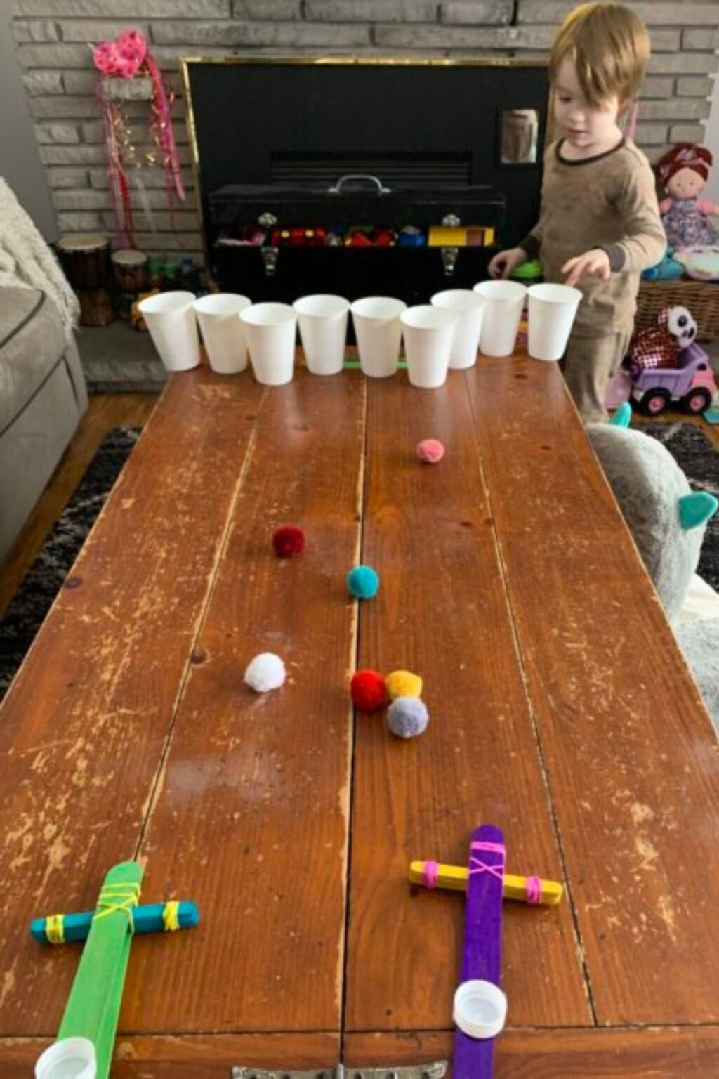 Easy Blowing with Straws & Pom Poms Activity for Toddlers - HOAWG